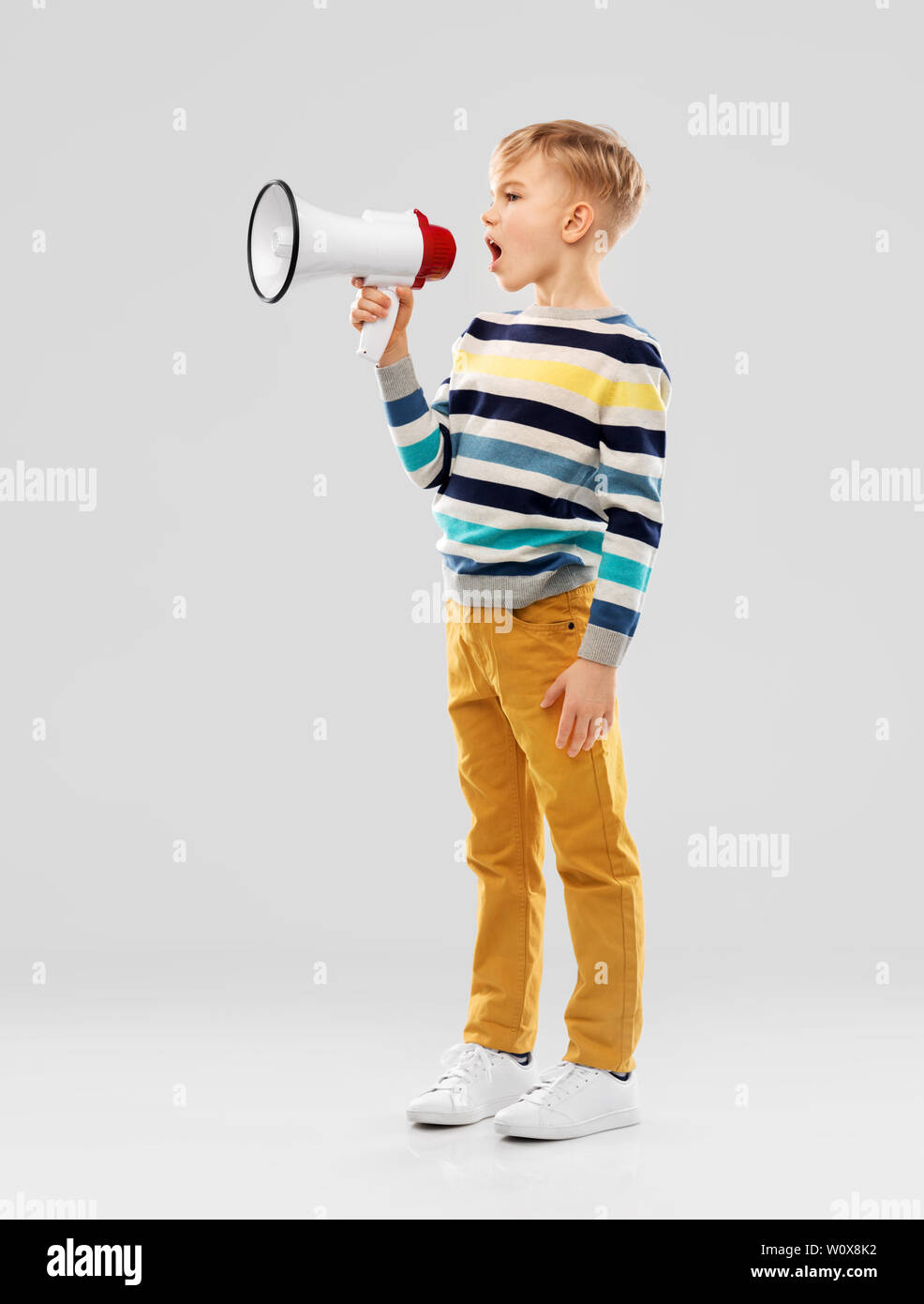 little boy speaking to megaphone Stock Photo - Alamy