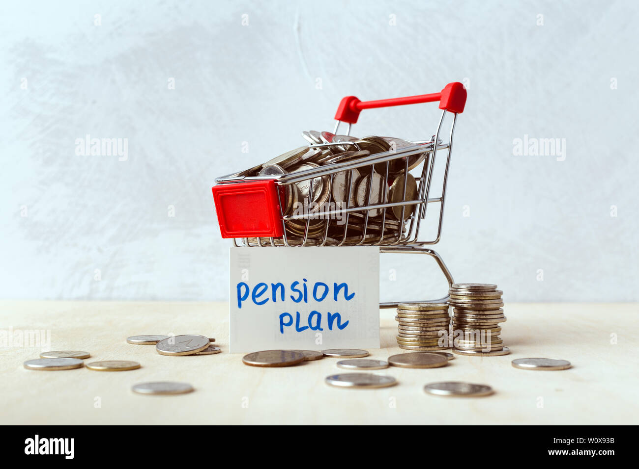 Saving Money Concept. Shopping trolley or cart with coin Stock Photo ...