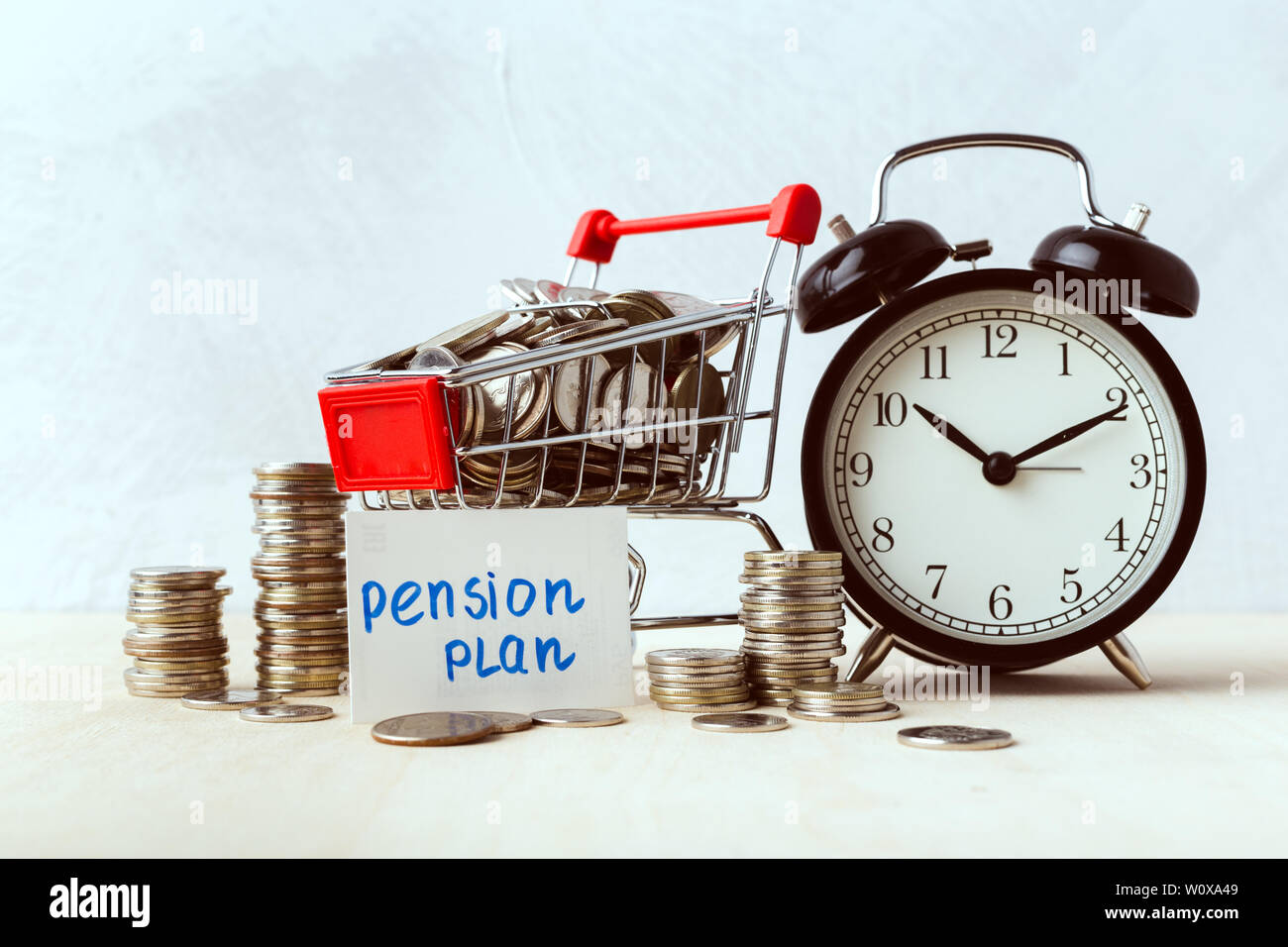 Saving Money Concept. Shopping trolley or cart with coin Stock Photo ...