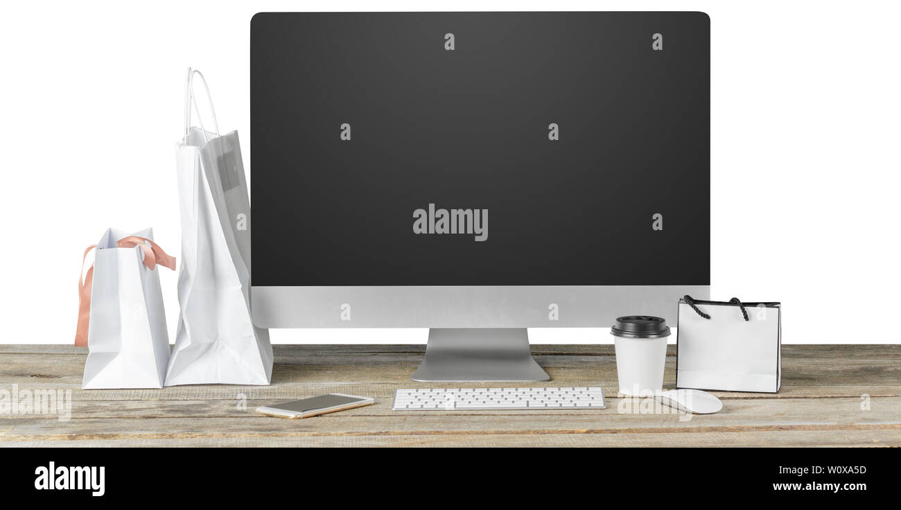 Messy table top home interior with computer monitor and keyboard. Front ...