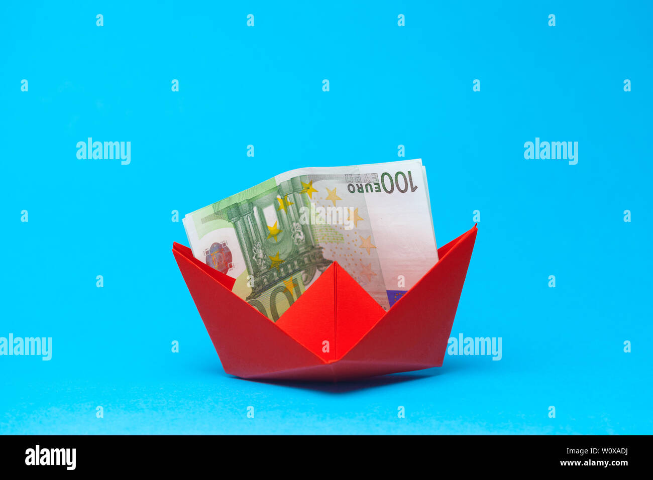 Money banknotes paper boats hi-res stock photography and images - Alamy