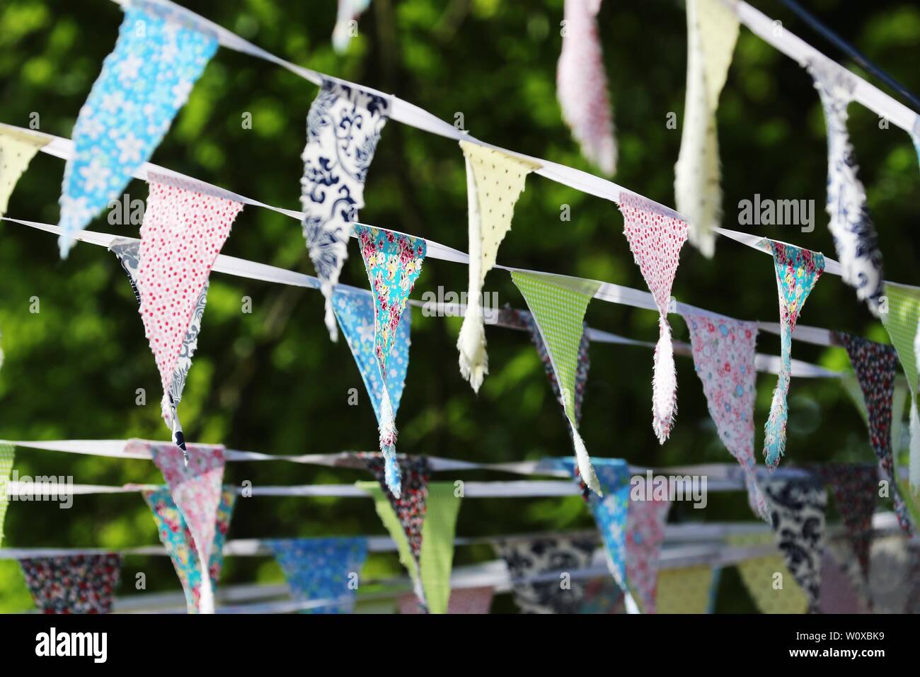 Bunting flags on strings hi-res stock photography and images - Alamy