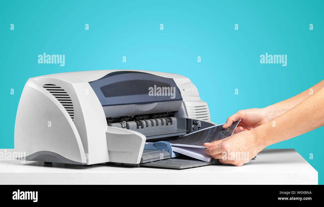Printer copier machine on a bright colored background Stock Photo - Alamy