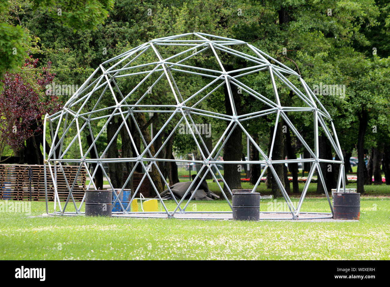 Metal dome like frame with entrance and barrel weights left in local ...