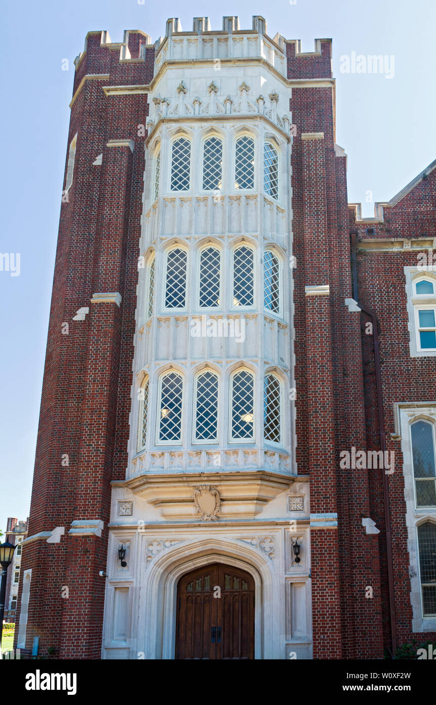 historic university building facade and entrance of neo-gothic ...
