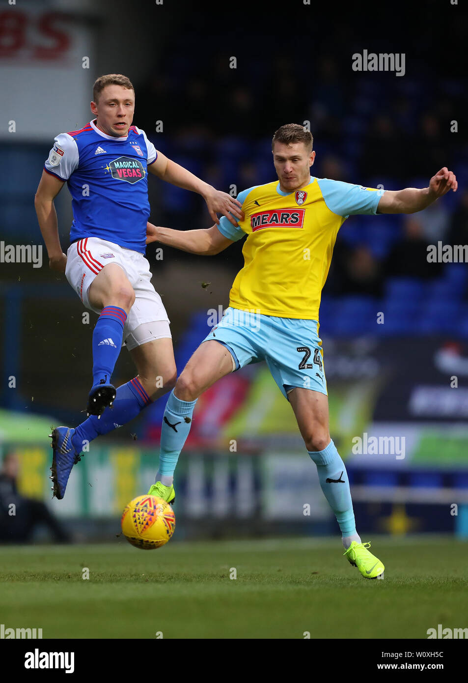 Matthew Pennington of Ipswich Town and Michael Smith of Rotherham ...