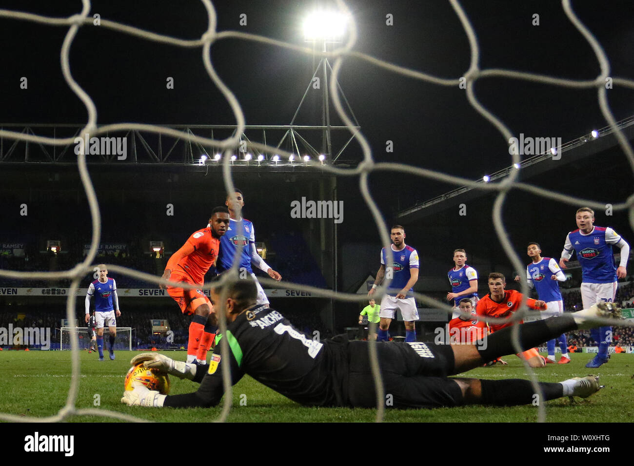 Jordan Archer of Millwall gathers up a shot from Freddie Sears of ...