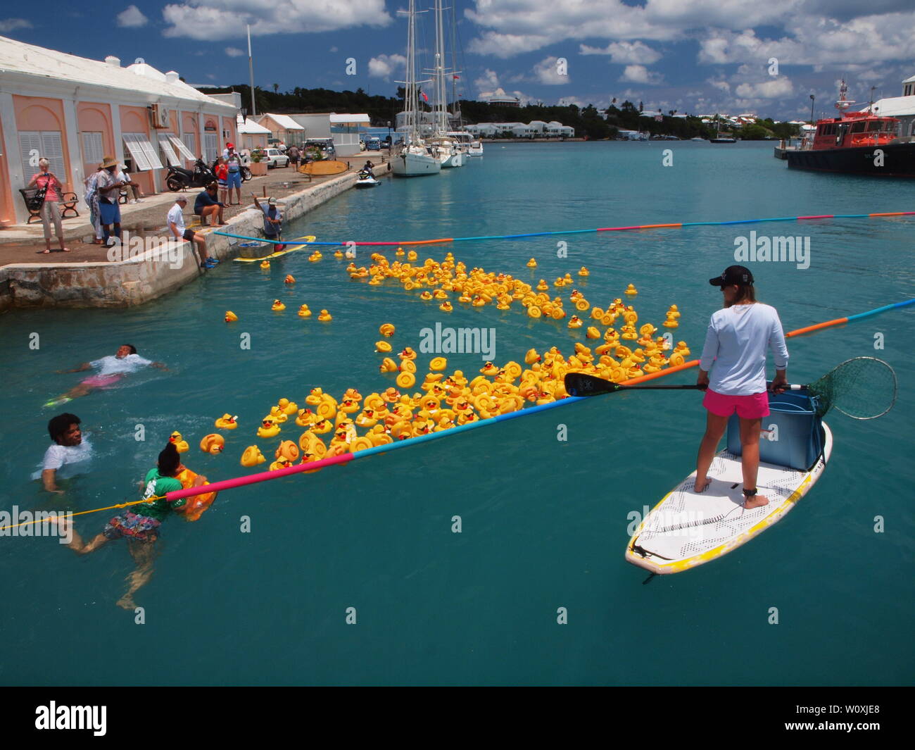 Girl on duck floating rubber hi-res stock photography and images - Alamy