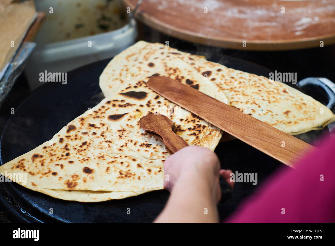 Turkish woman making flat bread hi-res stock photography and images - Alamy