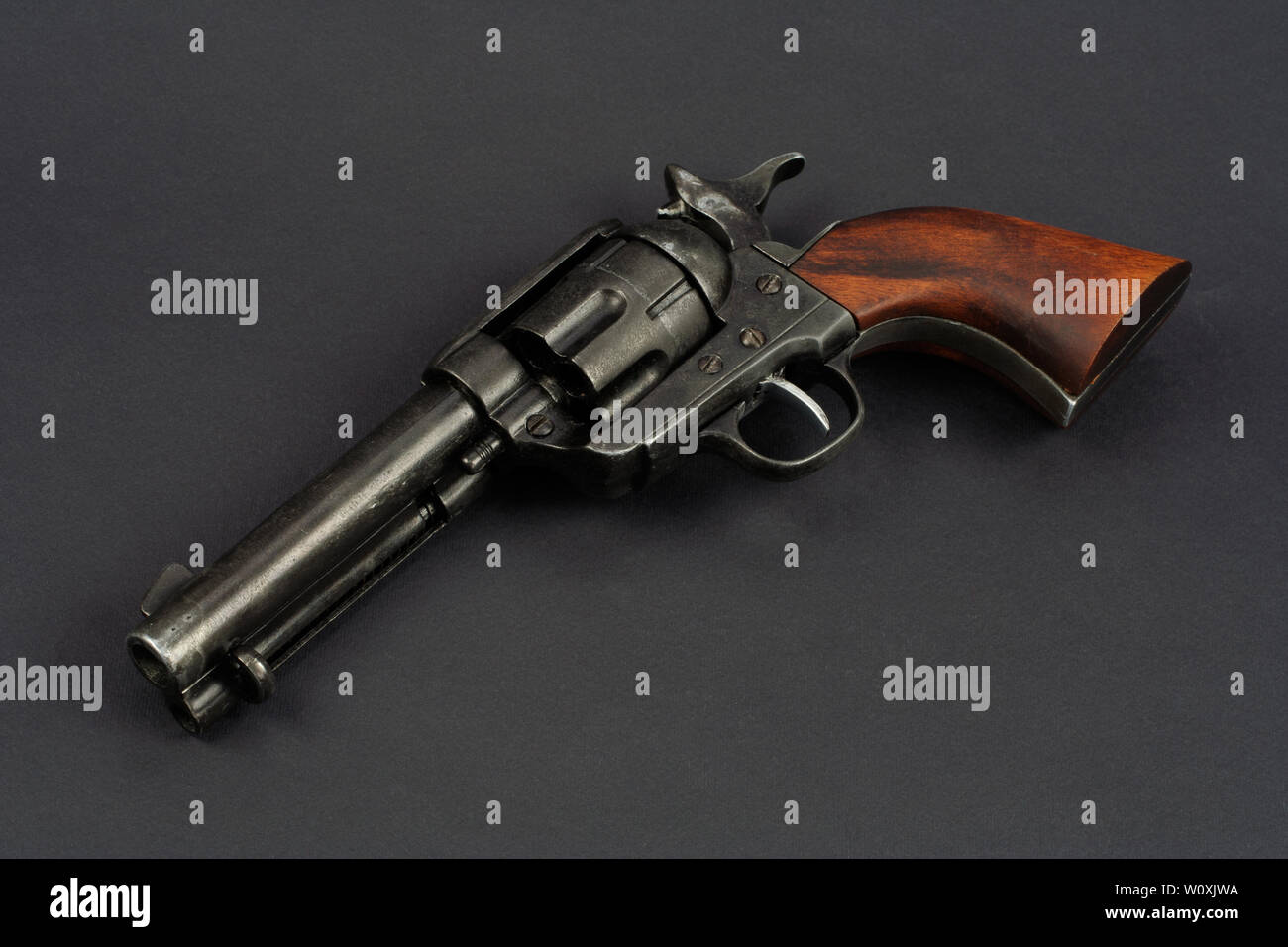 wild west revolver - colt single action army on black background Stock ...