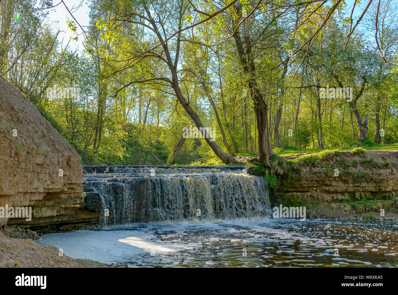 Waterfall on the river Sablinka in the village of Ulyanovsk, Leningrad ...