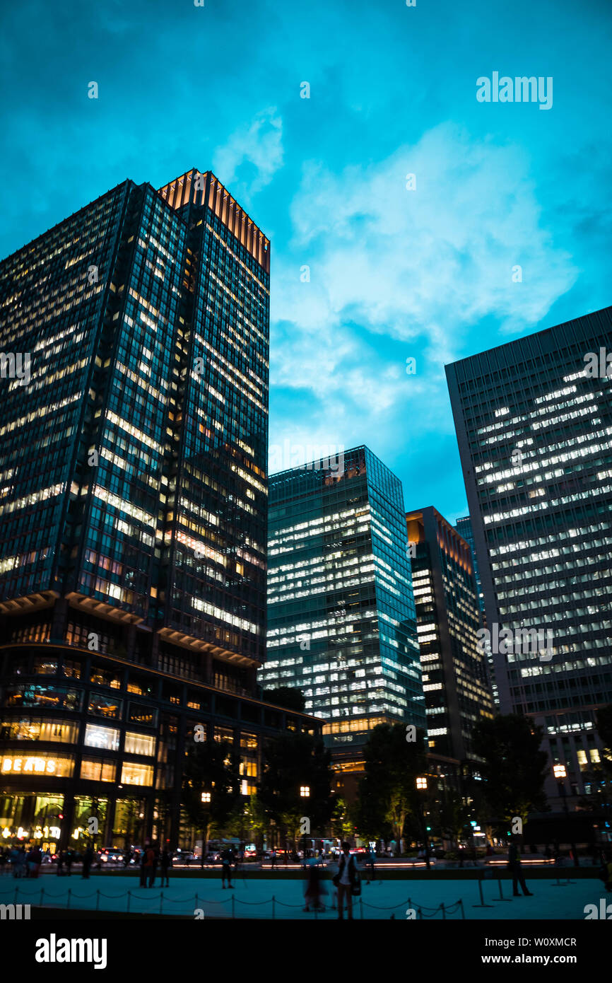 Modern office building at Marunouchi Plaza during Twilight. Portrait ...