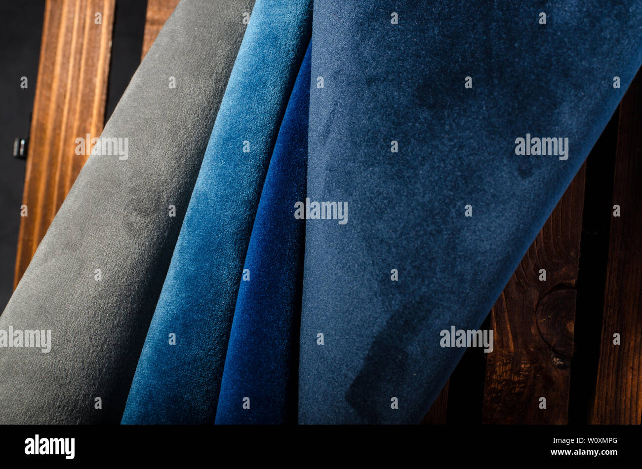 Bright collection of navi color velour textile samples. Fabric texture ...