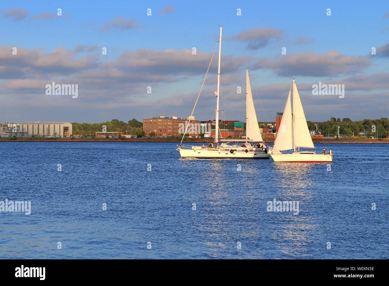 View on the baltic sea at the port of Kiel with some boats and ships ...