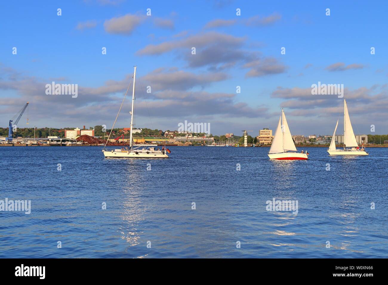 View on the baltic sea at the port of Kiel with some boats and ships ...