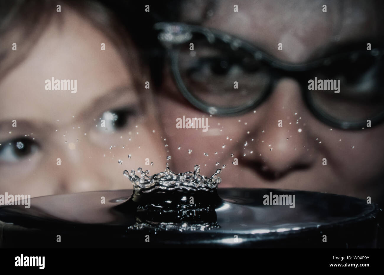 One water drop splash of H20 water mom and daughter learning Stock ...