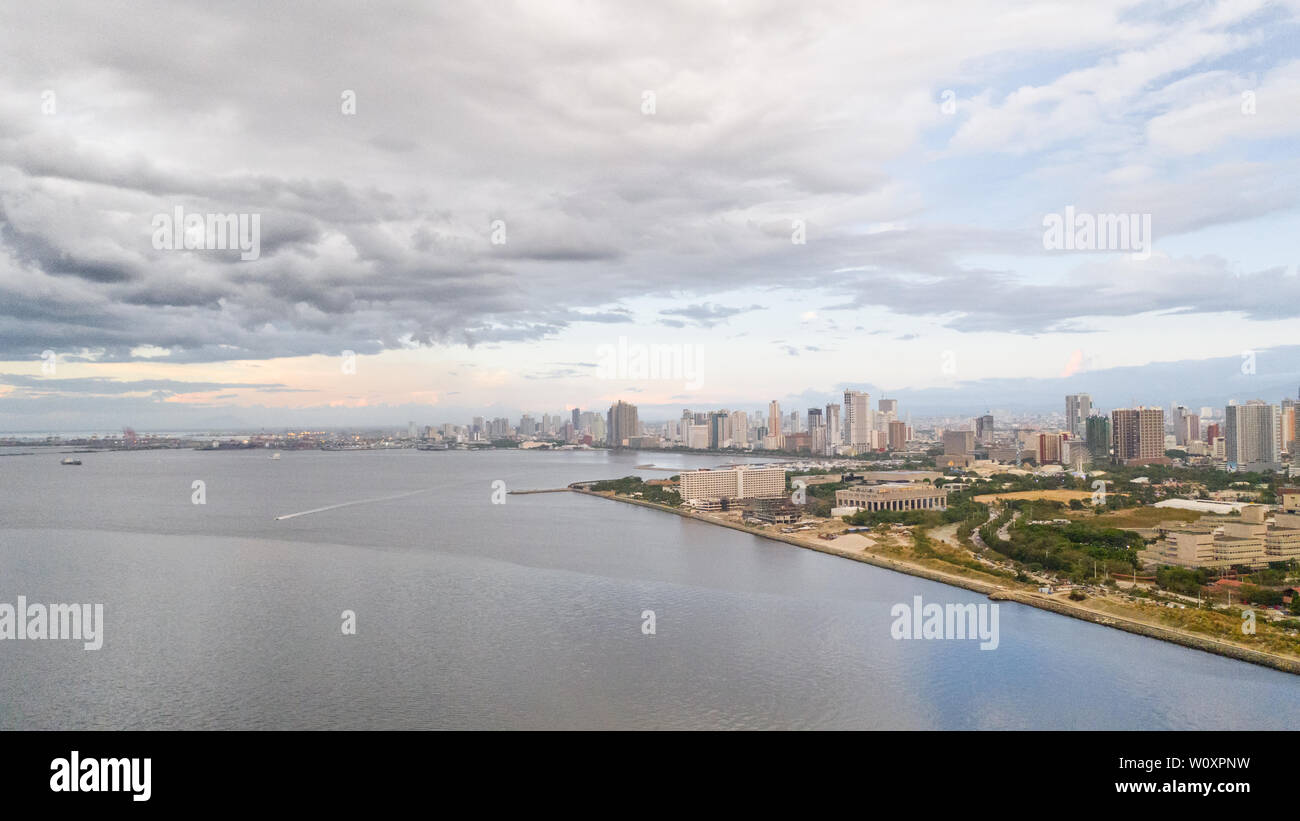 Manila city in the morning, view from above. Panorama of a large port ...