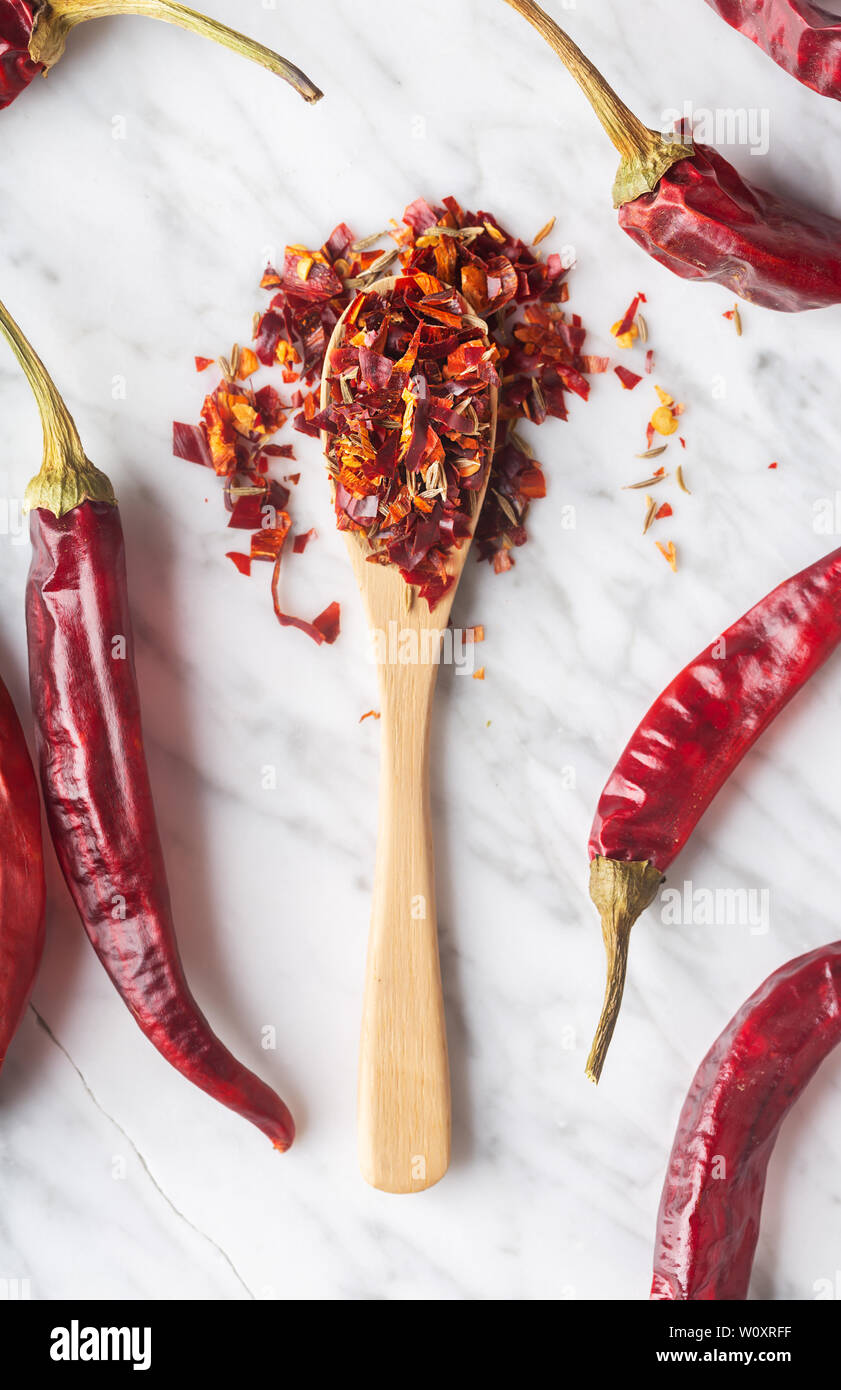 Spicy Chili paste mix with peppers on stone background. This condiment ...
