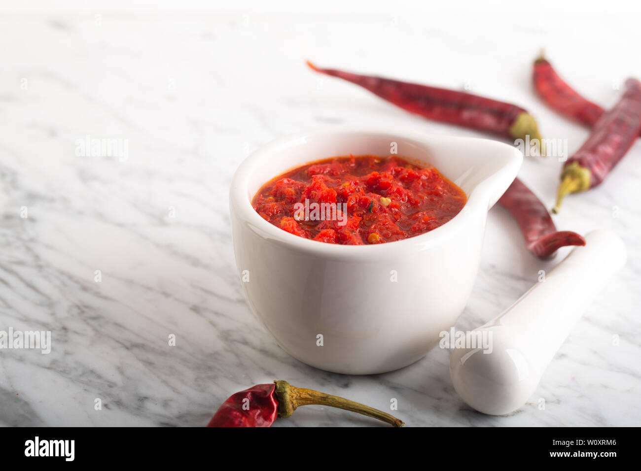 Traditional Maghrebi hot chili pepper sauce paste harissa. Tunisia and ...