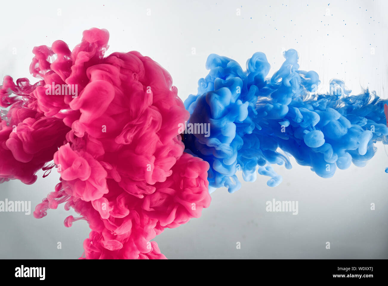 cloud of colors from ink splash in water Stock Photo - Alamy