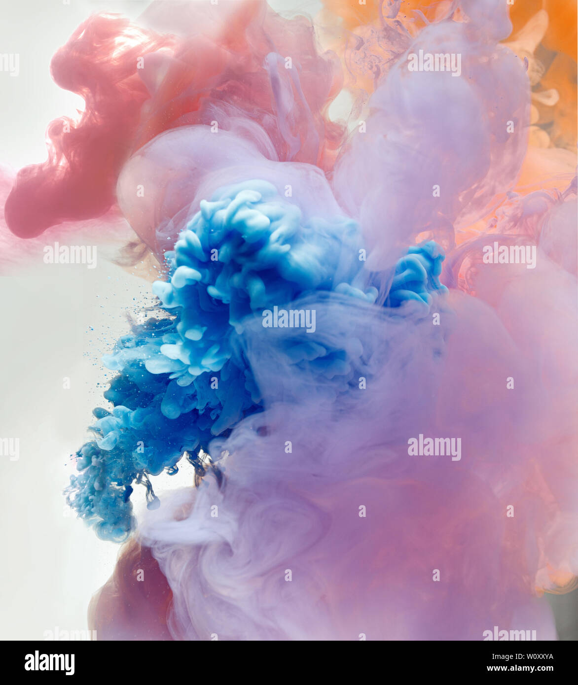 beautiful pastel ink colors in water splashing Stock Photo - Alamy