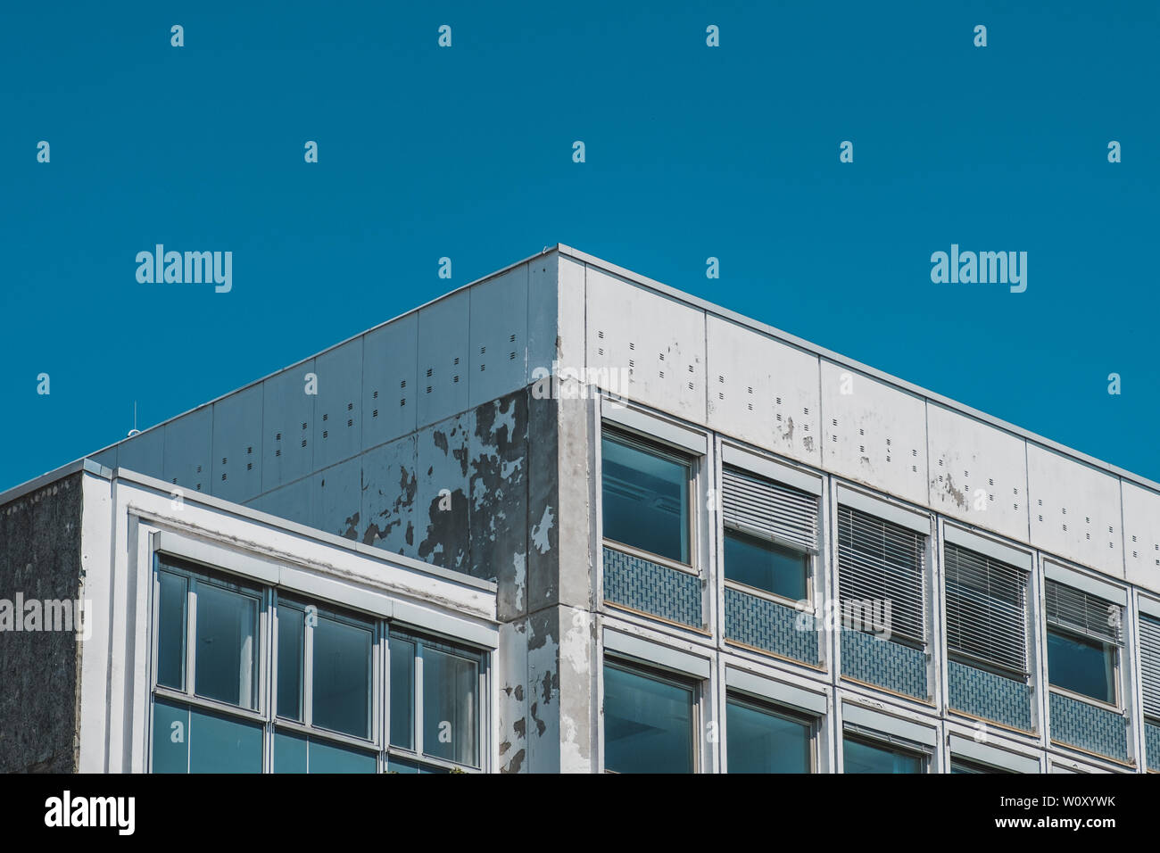old building facade with damaged facade - restoration concept Stock ...