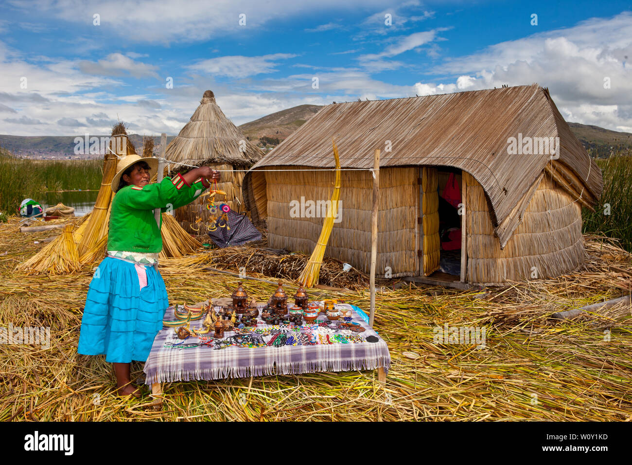 People of Uros islands at lake Titicaca,Peru Stock Photo - Alamy