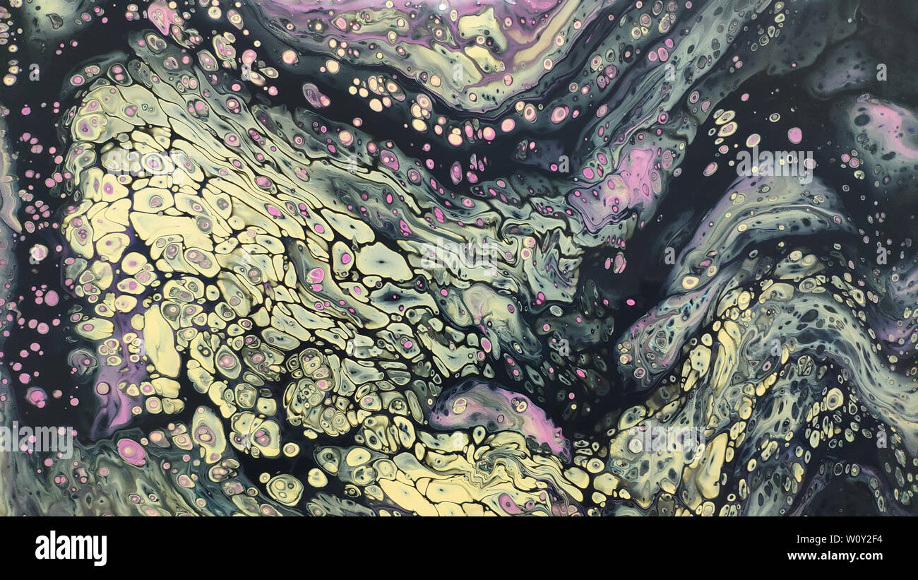 Abstract colorful liquid acrylic pattern made with fluid art technique ...