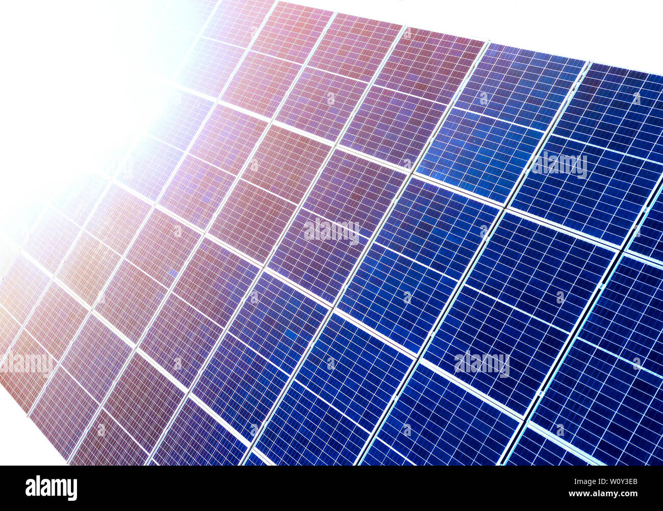 Close-up surface of lit by sun blue shiny solar photo voltaic panels ...