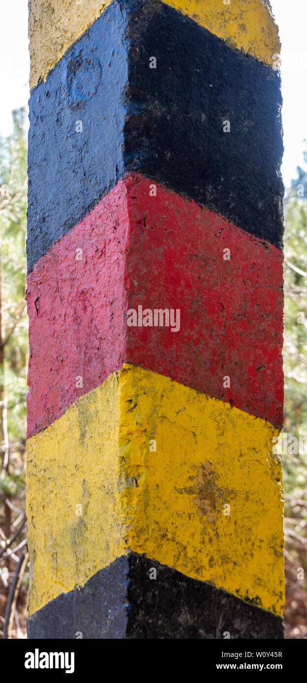 Historical black-red-golden border post at the former border between ...