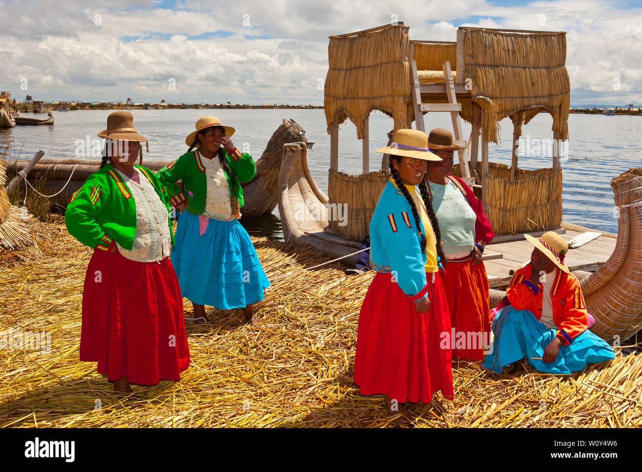 People of Uros islands at lake Titicaca,Peru Stock Photo - Alamy