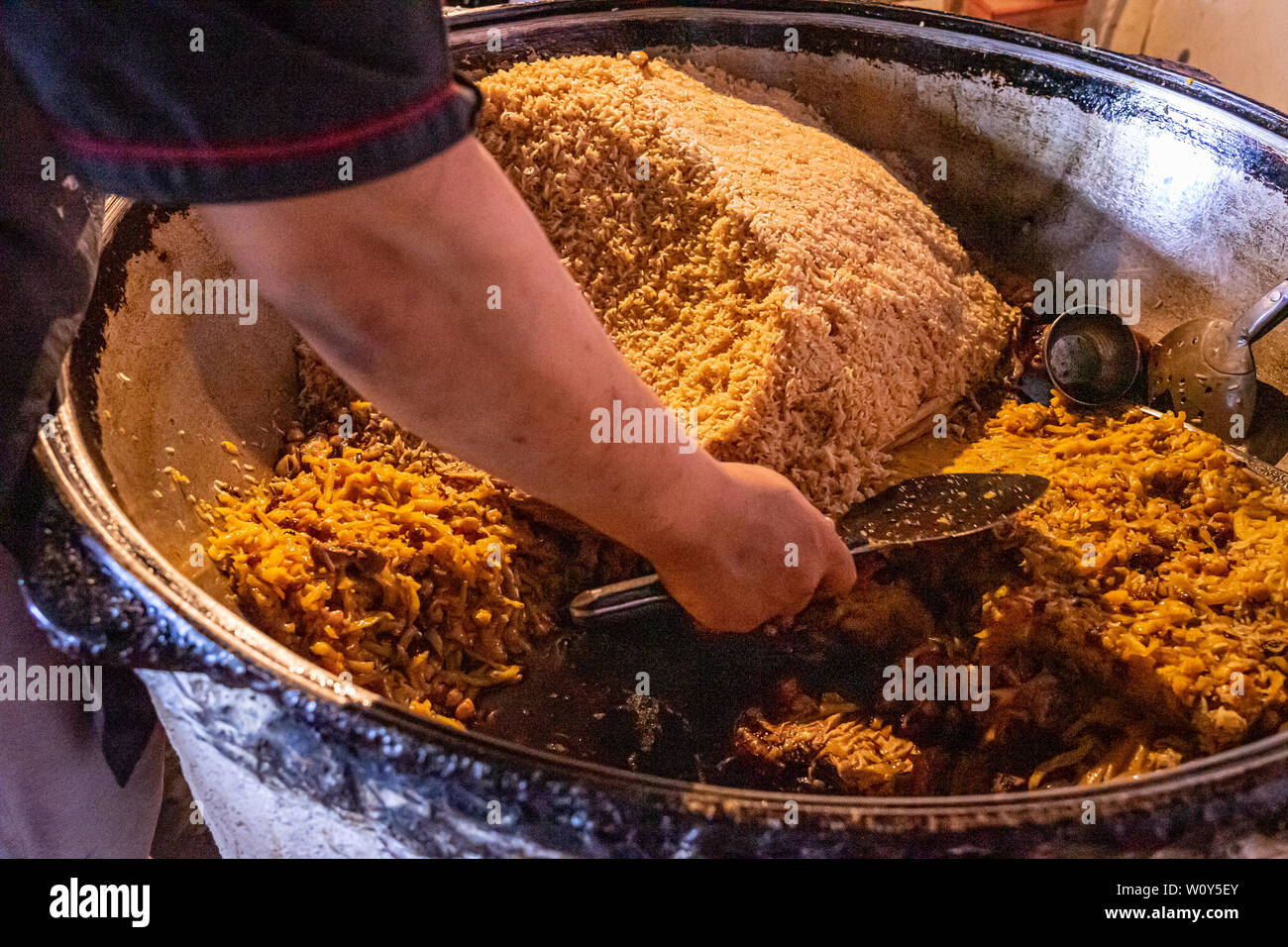 Cooking traditional Plov Stock Photo - Alamy