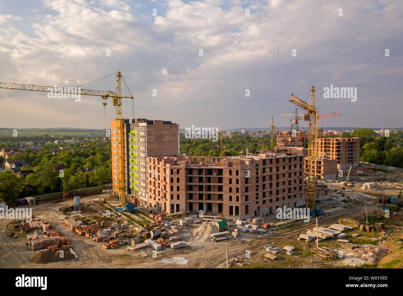 Aerial view of building site. Apartment or office building under ...