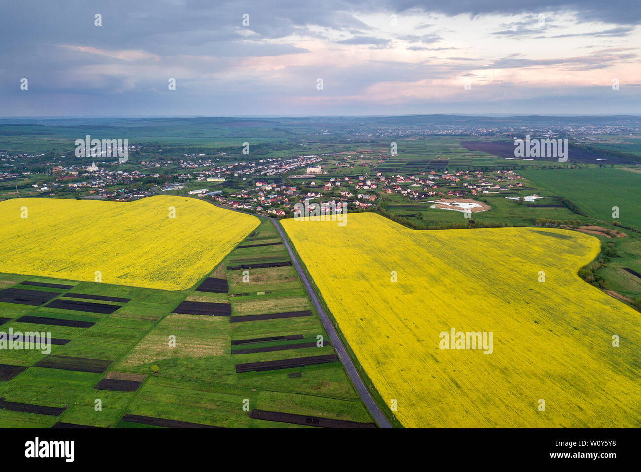 Rural landscape on spring or summer day. Aerial view of green, plowed ...