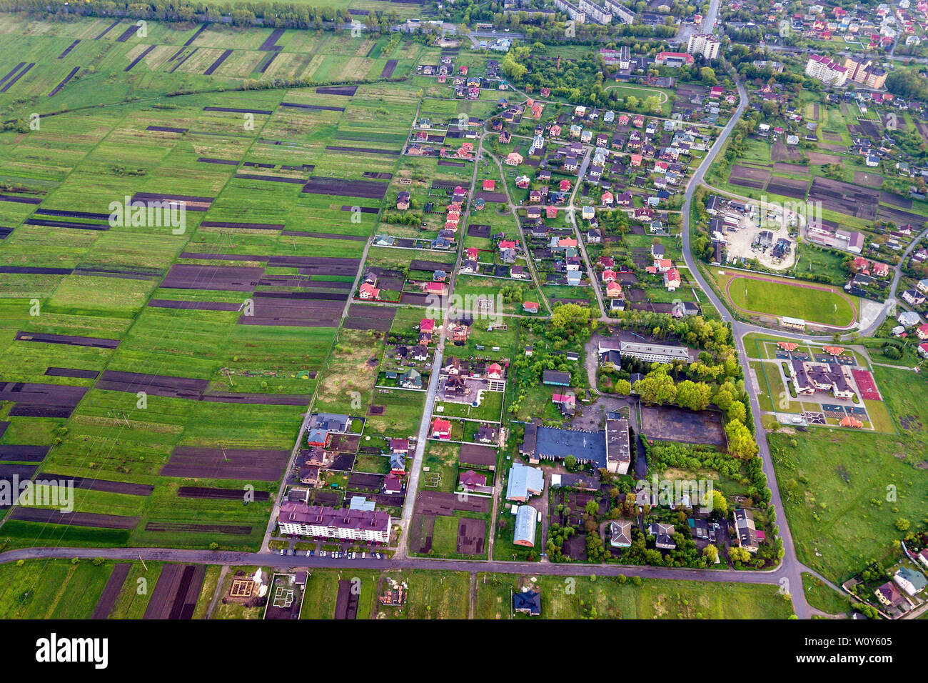 Rural landscape on spring or summer day. Aerial view of green and ...