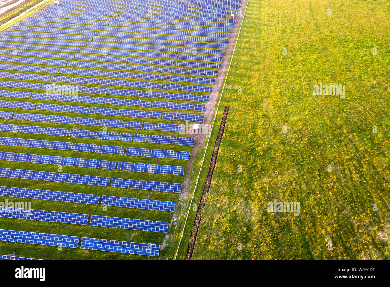 Large field of solar photo voltaic panels system producing renewable ...