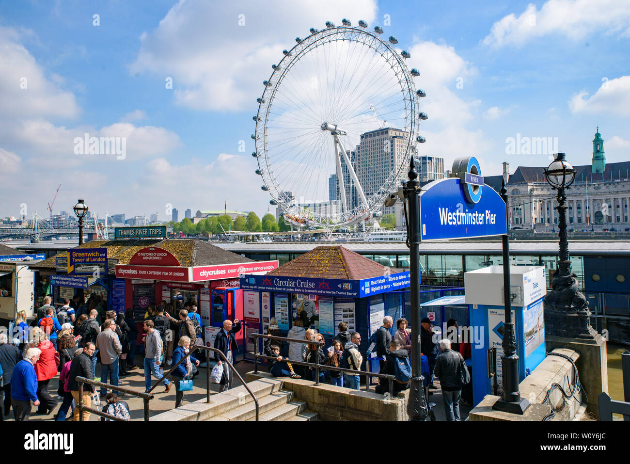 Westminster Millennium Pier on the north bank of the River Thames with ...