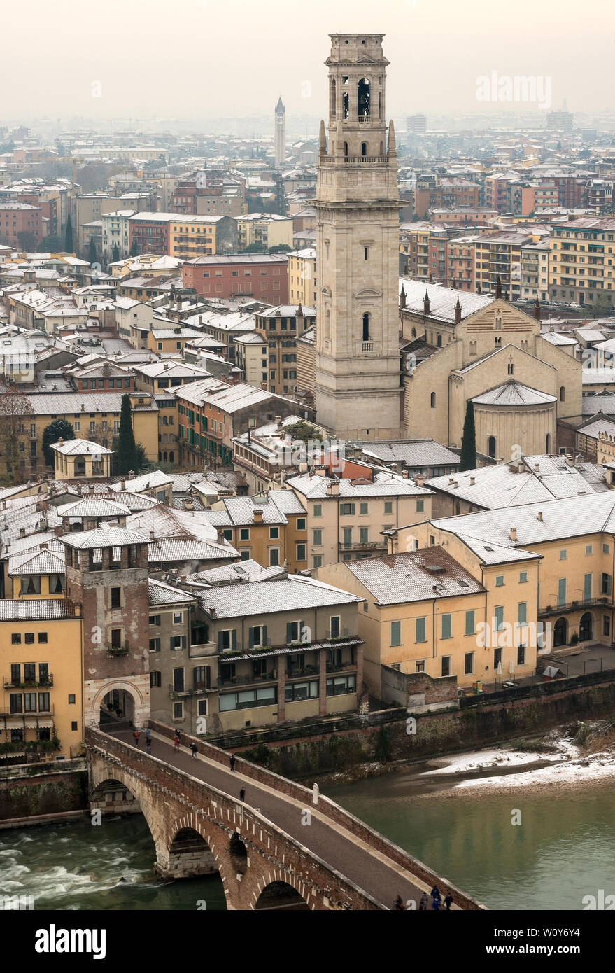 Aerial view of the city of Verona in winter with snow. The cathedral ...