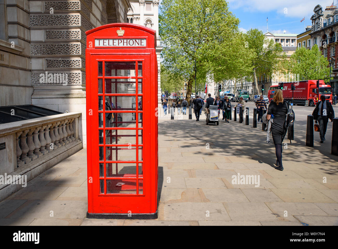 Red telephone box on the street in London, United Kingdom Stock Photo ...