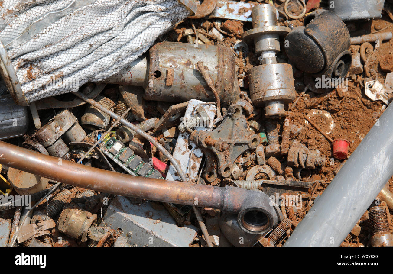 broken and rusted items in the recycling center Stock Photo - Alamy