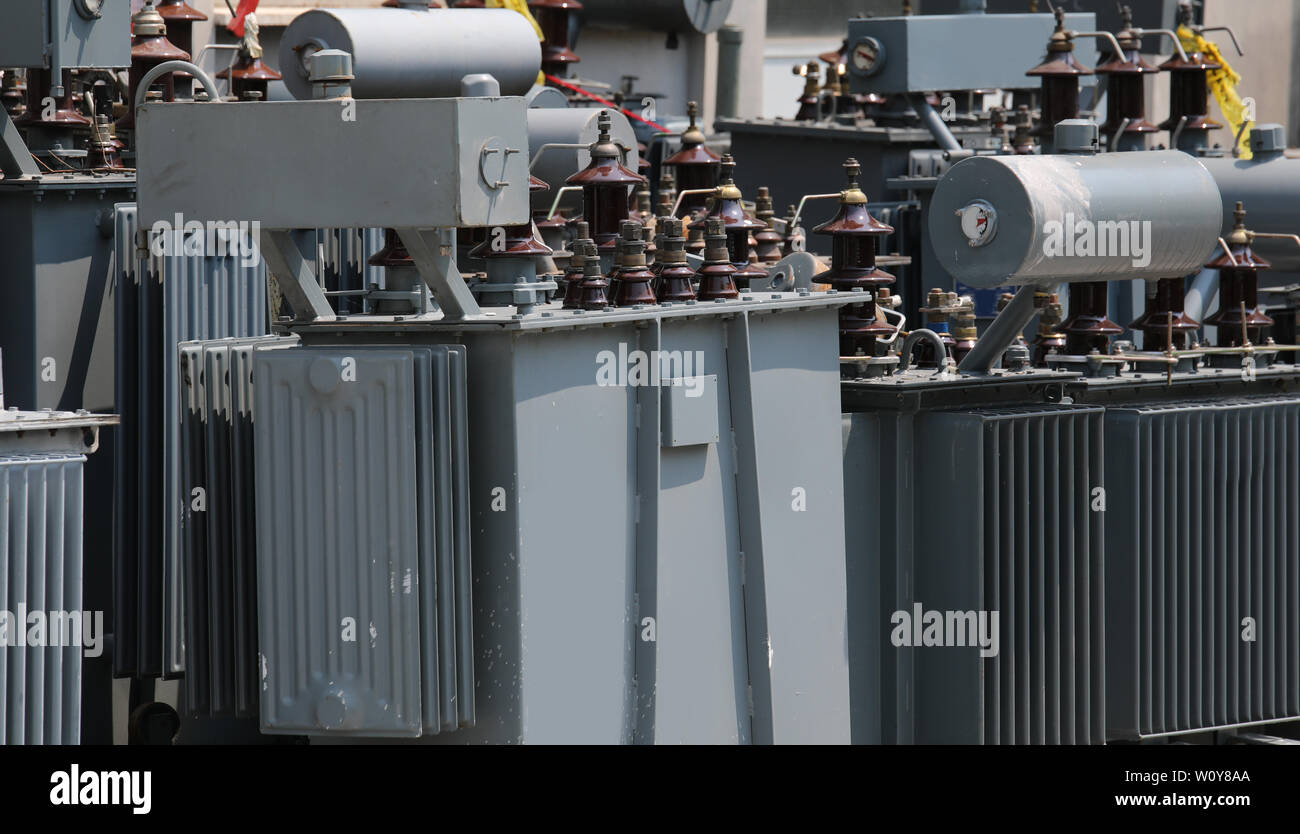 many electrical transformers to transform the voltage from high to low ...