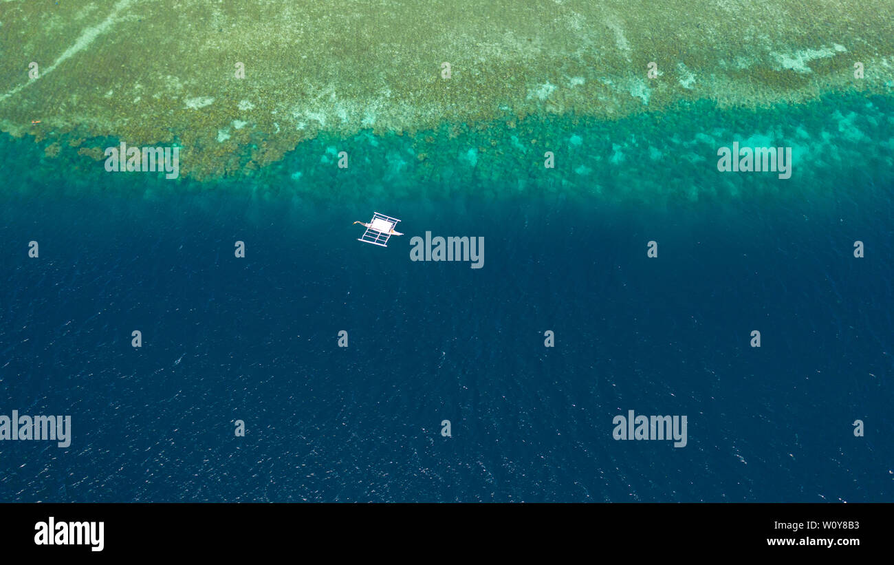 Boat on the Philippines - Aerial drone photo of ship on coral reef ...