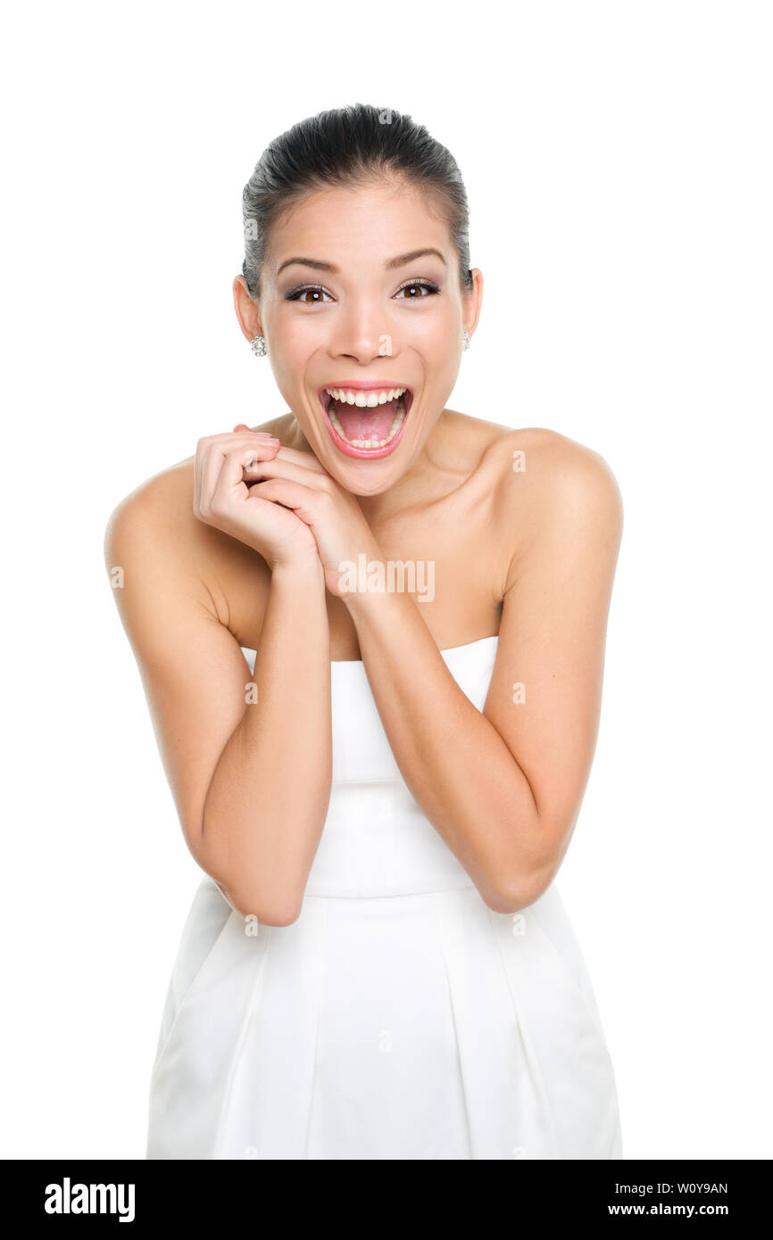 Happy excited young woman isolated on white background. Asian lady in ...