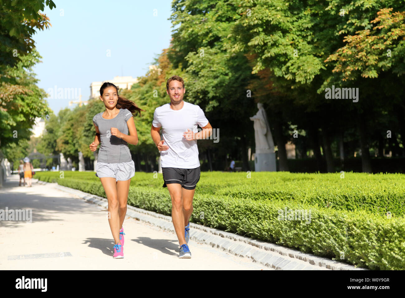 Men Running In El Buen Retiro Park High Resolution Stock Photography ...