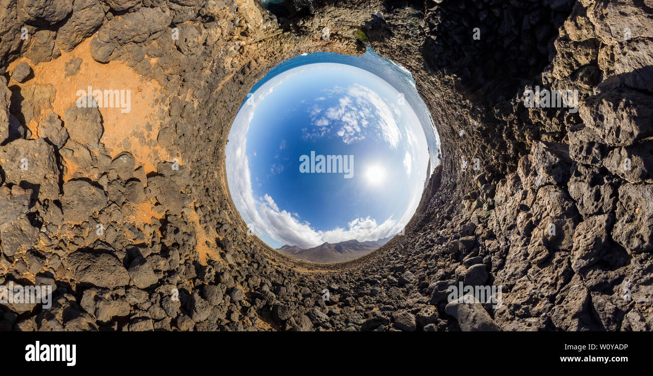 Spherical inverse little planet panorama of the rocky coast of the ...