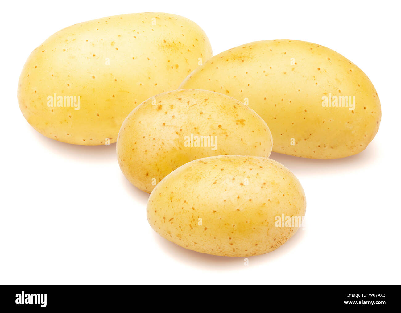 Four lovely whole potatoes isolated on white background Stock Photo - Alamy