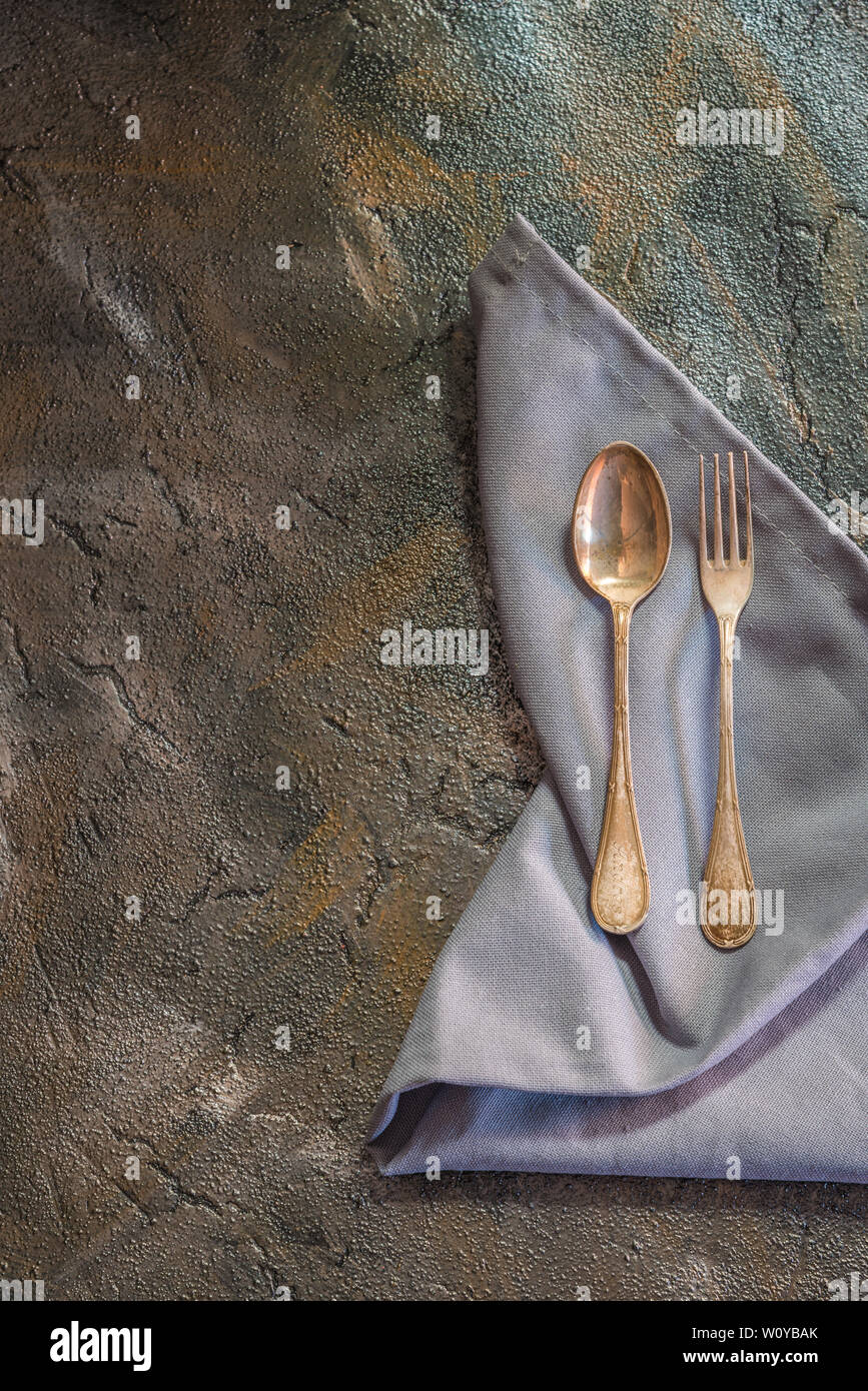 Overhead view of a rustic table with cutlery Stock Photo - Alamy