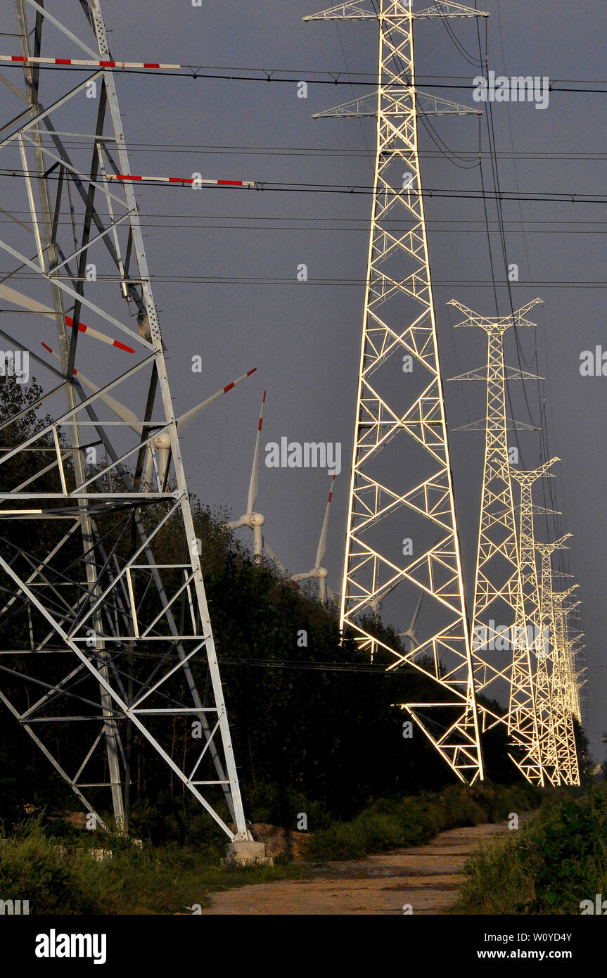 electricity pylons across Chinese countryside Stock Photo - Alamy