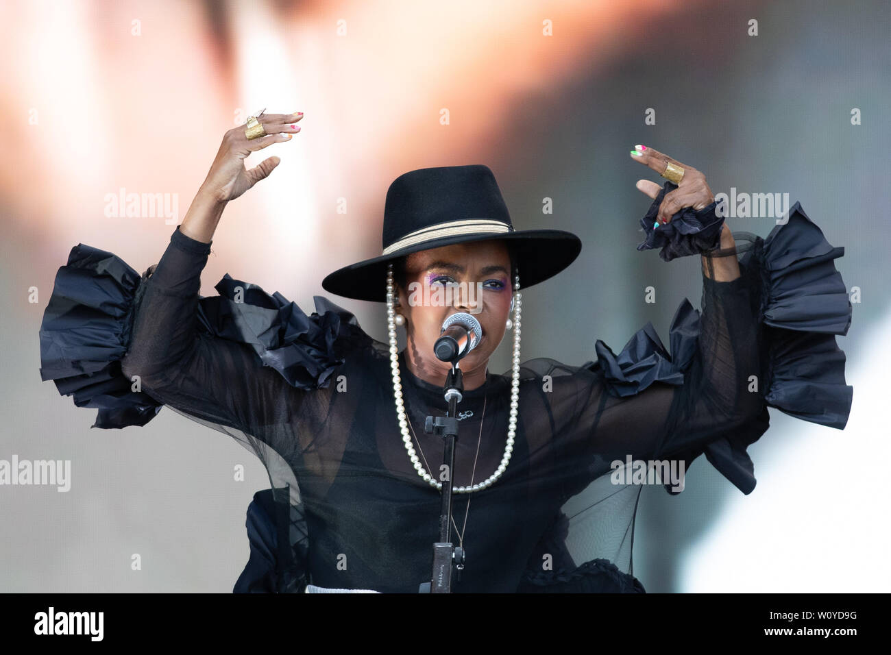 Lauryn Hill performing on the Pyramid Stage during the Glastonbury ...