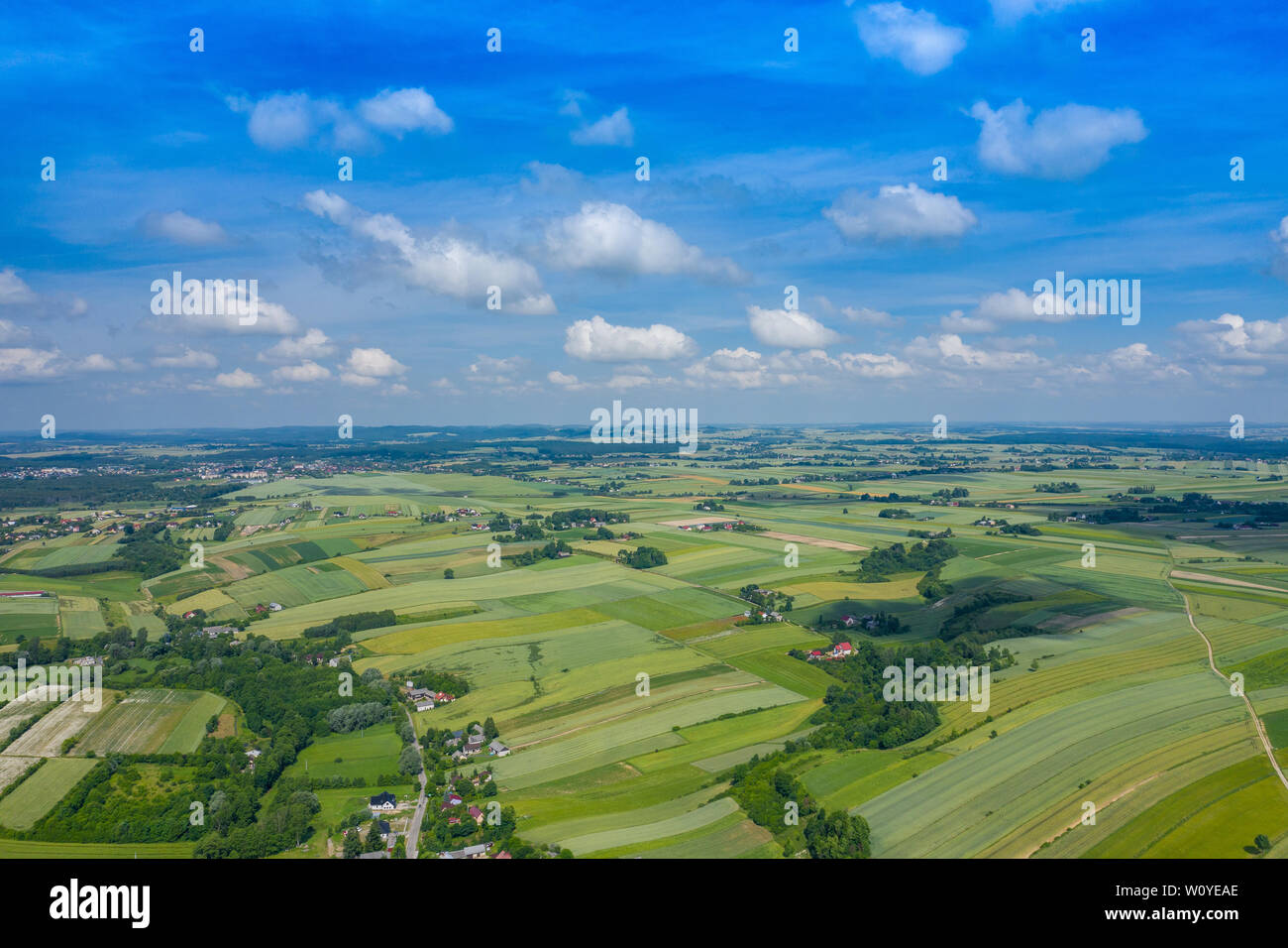 Aerial view of farmlands and mountains in rural Poland seen from drone ...